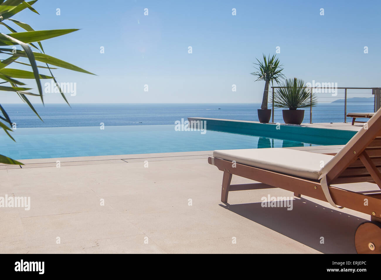 Luxury swimming pool and blue water Stock Photo - Alamy