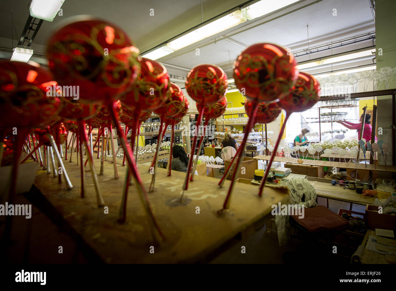 Worker completes glass ornaments in Slezska Tvorba factory in Opava ...