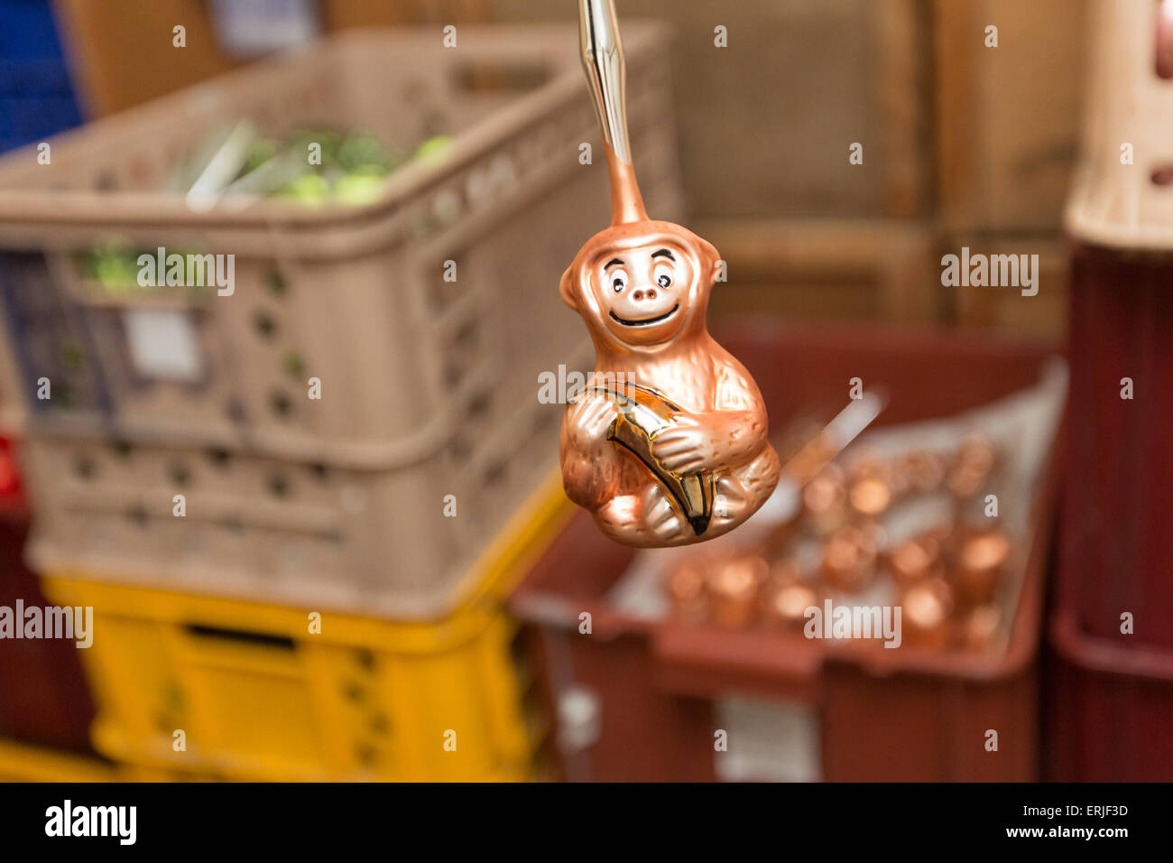 Worker completes glass ornaments in Slezska Tvorba factory in Opava ...