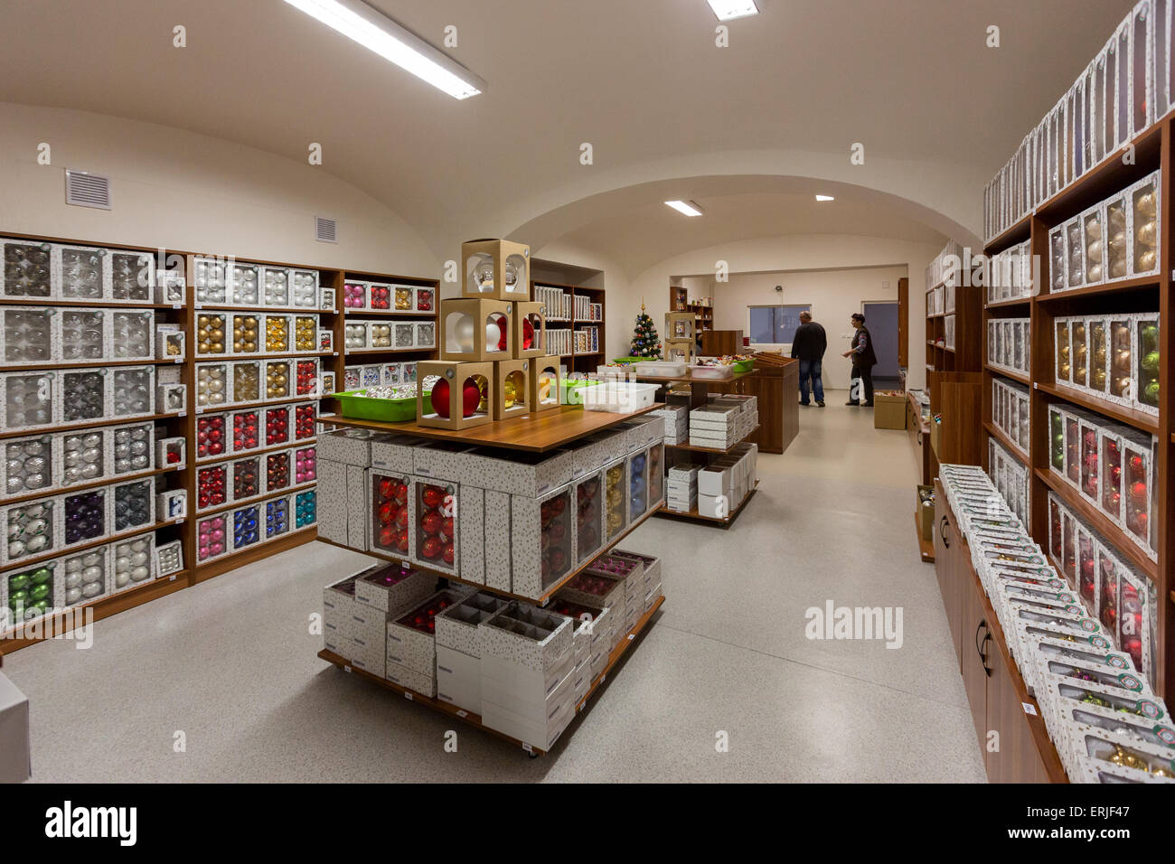 Worker completes glass ornaments in Slezska Tvorba factory in Opava ...