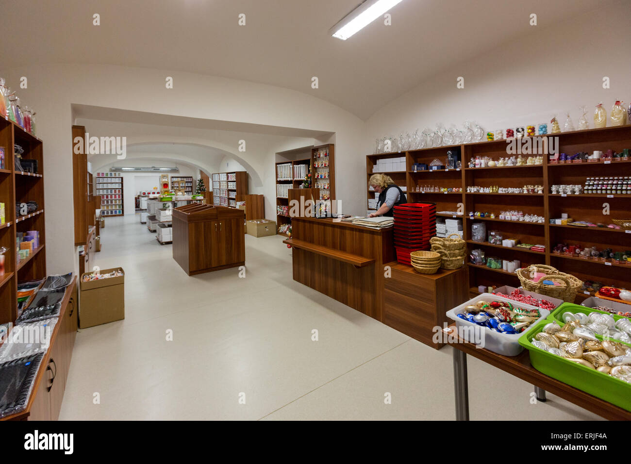 Worker completes glass ornaments in Slezska Tvorba factory in Opava ...