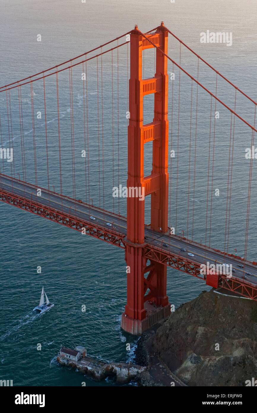 Aerial view over San Francisco and the Golden Gate Bridge at sunset ...