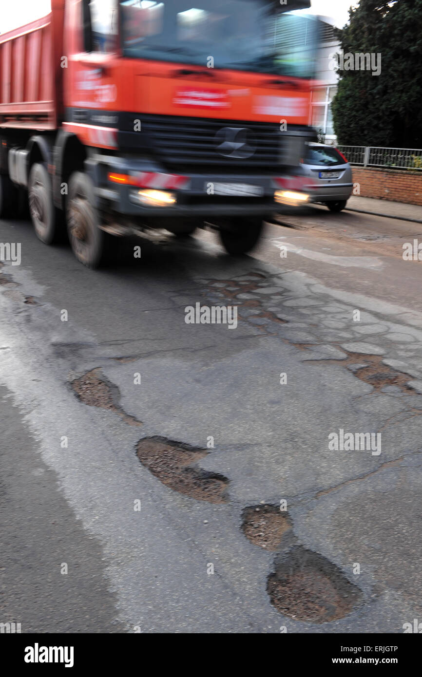 Road big potholes cars hi-res stock photography and images - Alamy