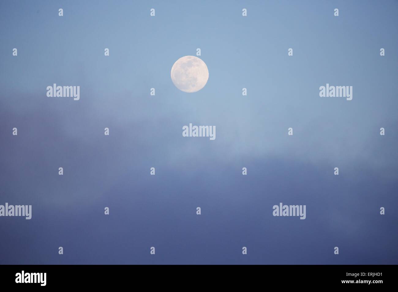 Moon clouds in blue sky hi-res stock photography and images - Alamy