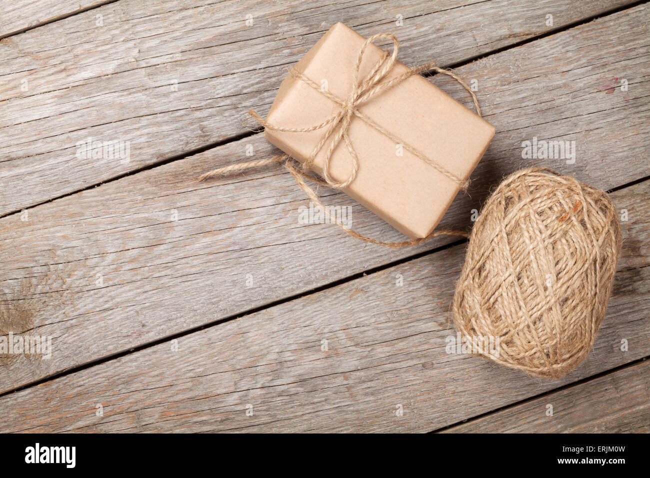 Gift wrapping over wooden table with copy space Stock Photo - Alamy