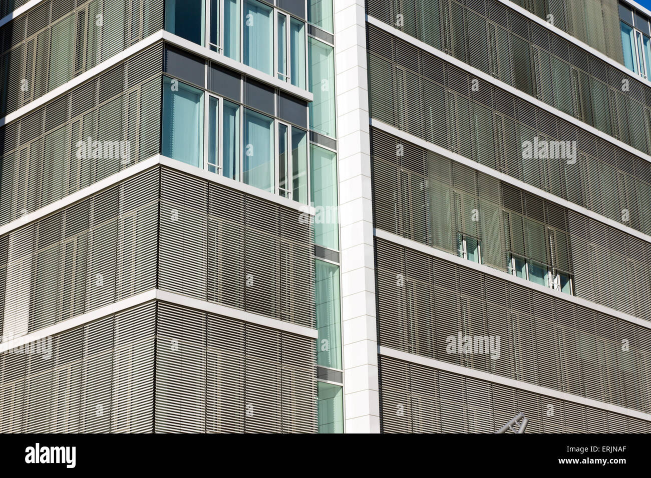 Detail of a modern office building with closed silver shutters Stock ...