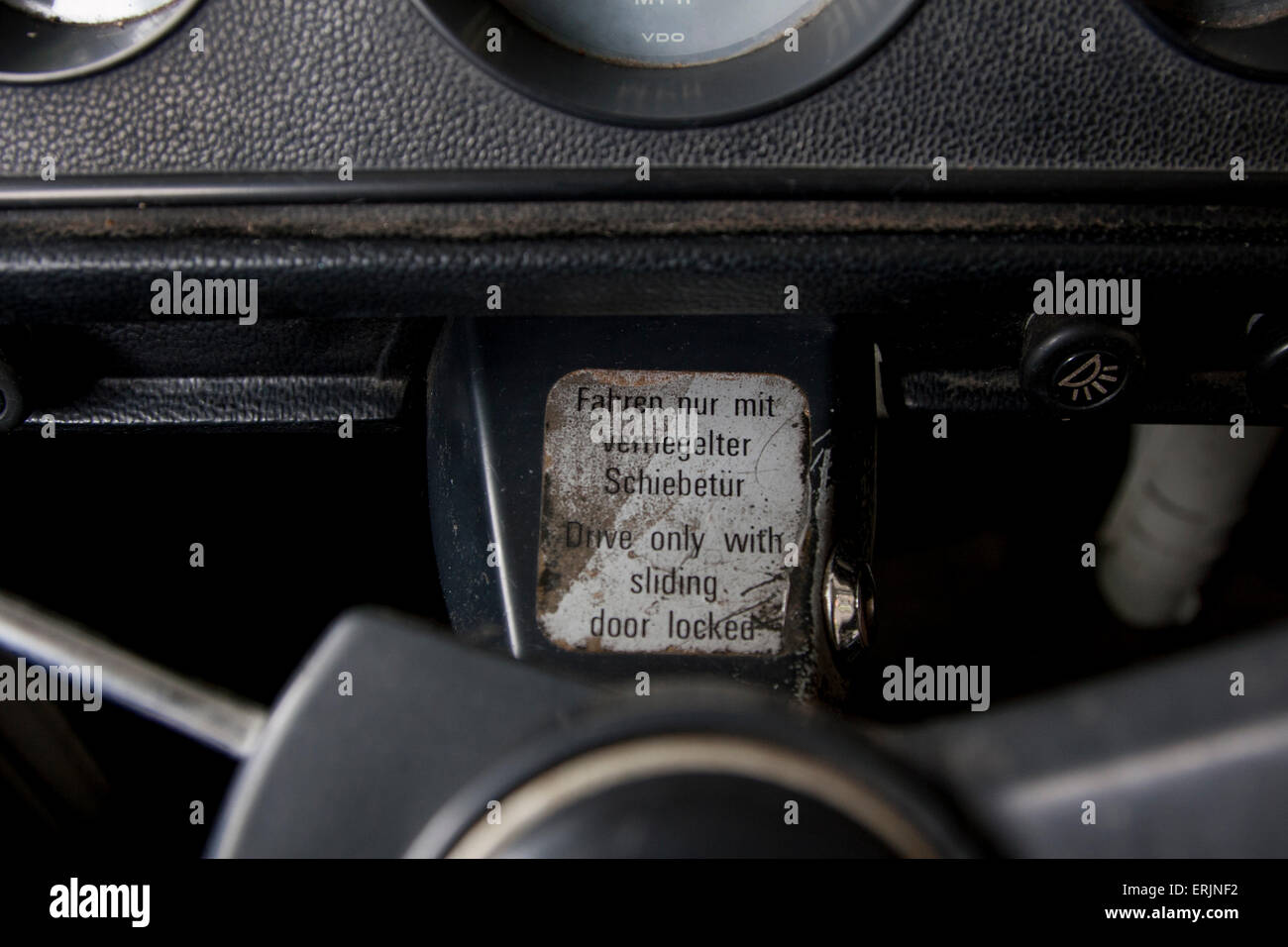 "Drive only with the sliding door locked" note on the steering column ...