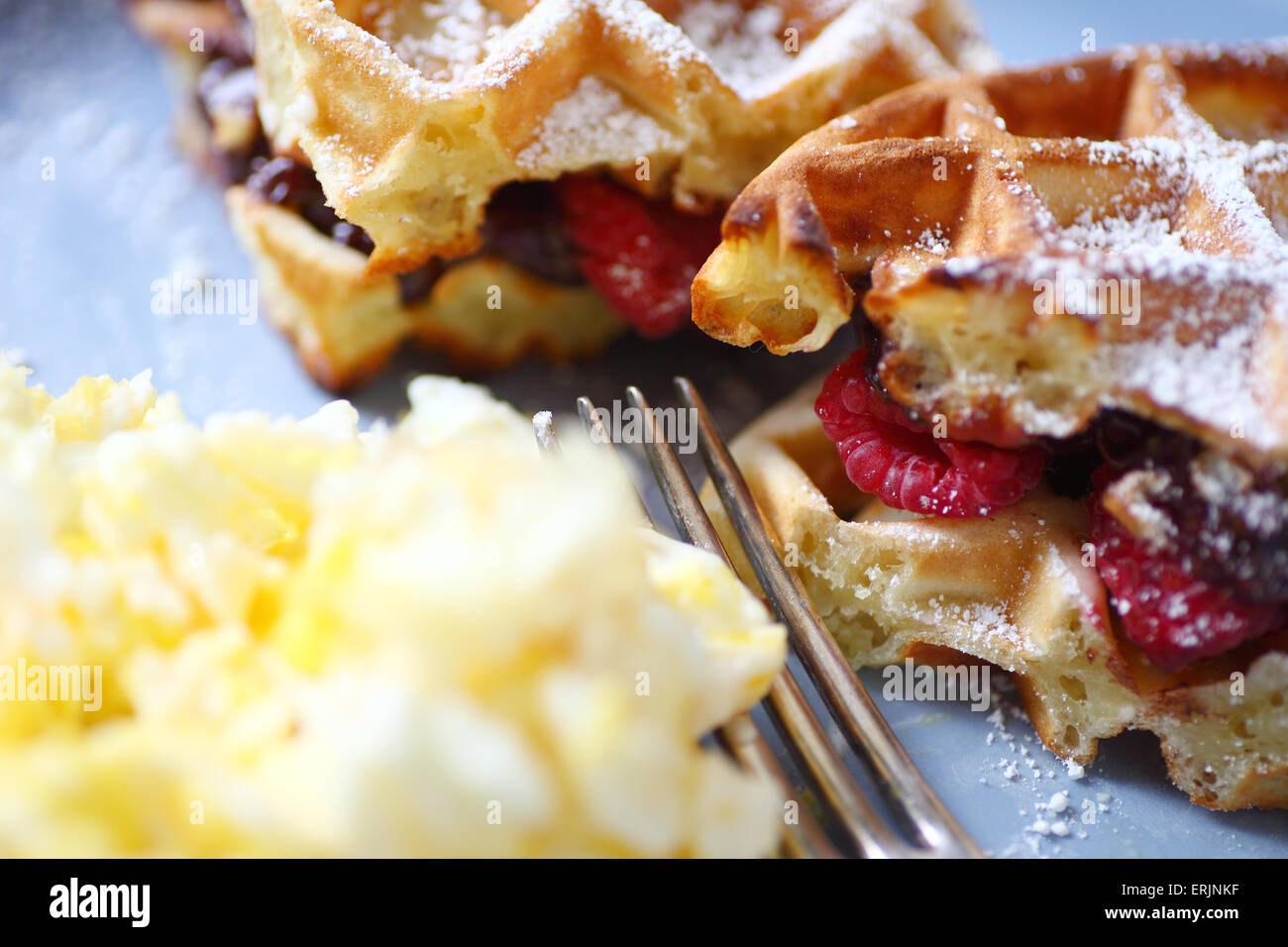 Waffles filled with fresh raspberries and chocolate spread and ...