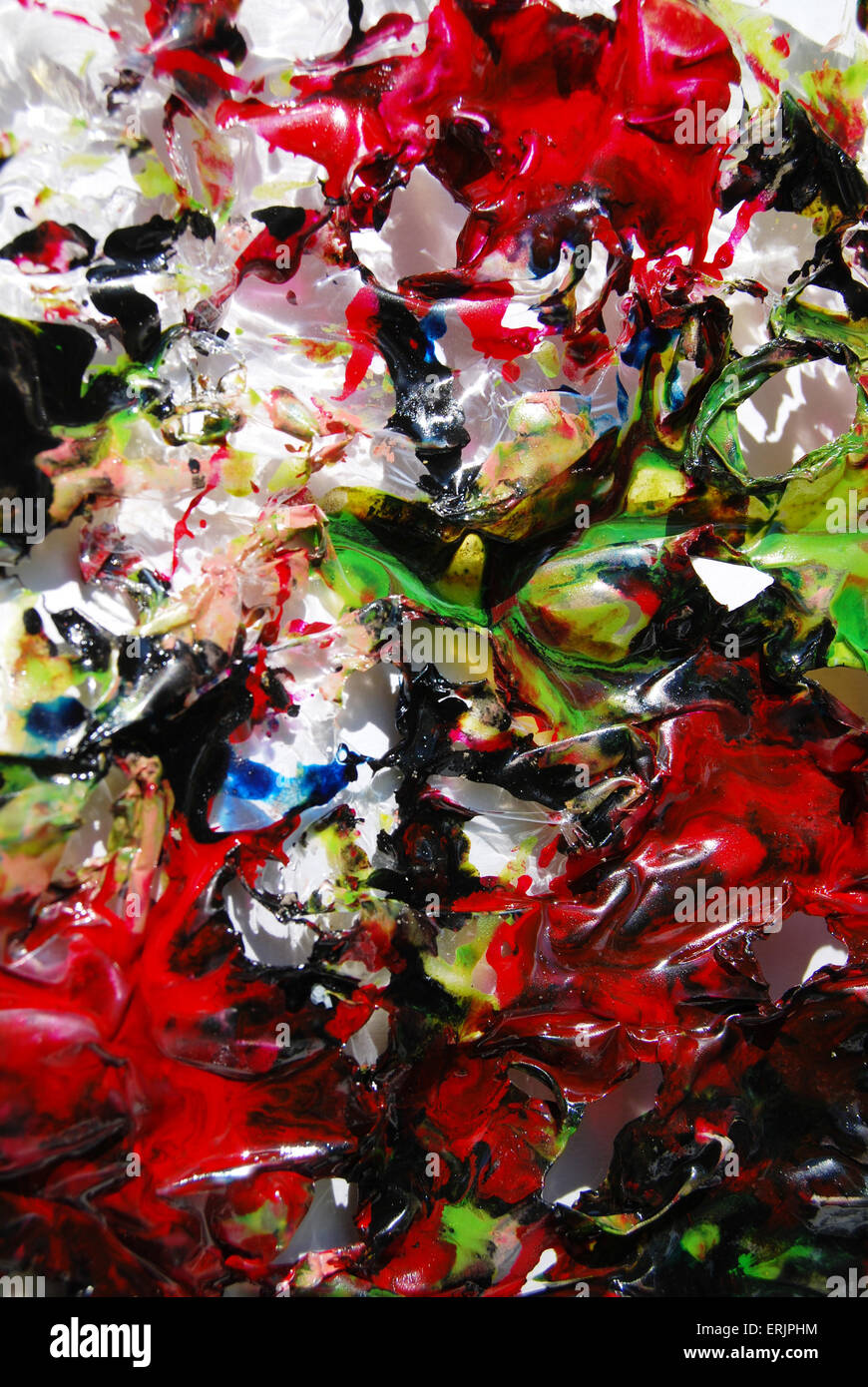 Paint on acetate, bright colour on crumpled plastic Stock Photo - Alamy