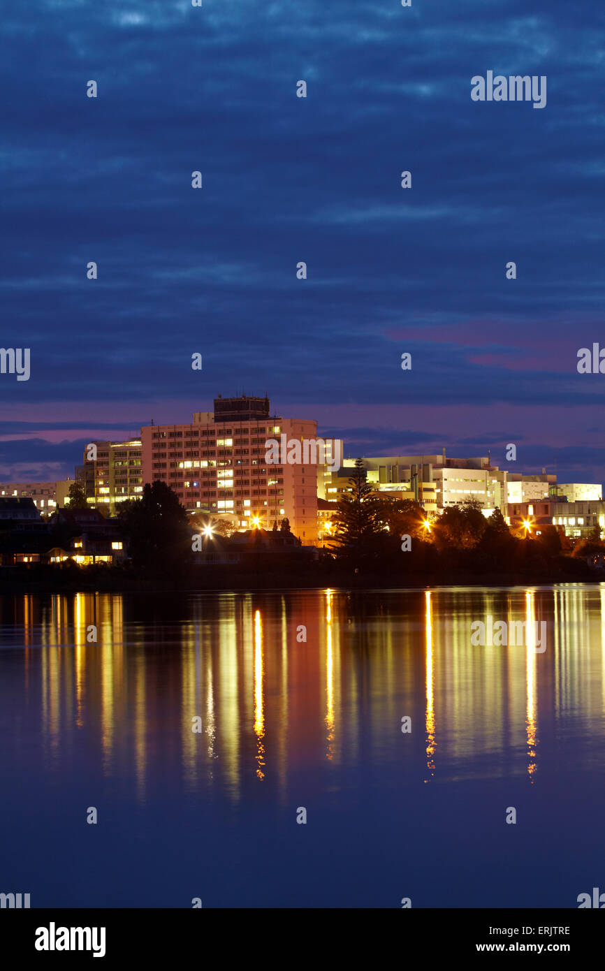 Waikato Hospital reflected in Lake Rotoroa at dawn, Hamilton, Waikato ...