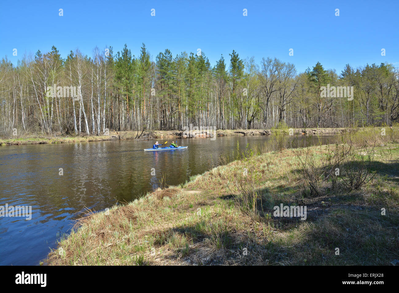 Kayak tourists on spring river. The journey on the river PRA in the ...