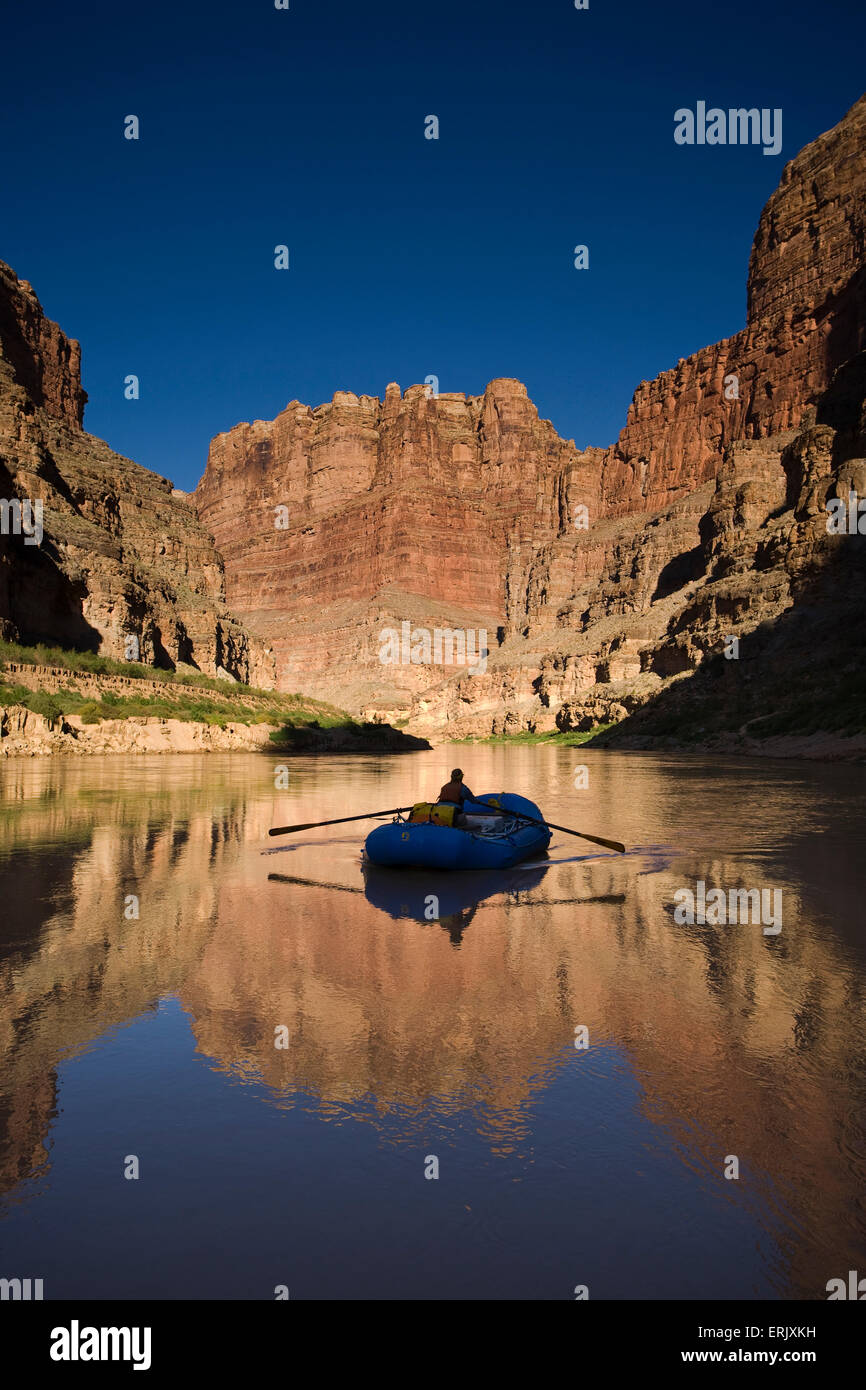 A person rowing an inflatable raft down the Colorado river, Utah Stock ...
