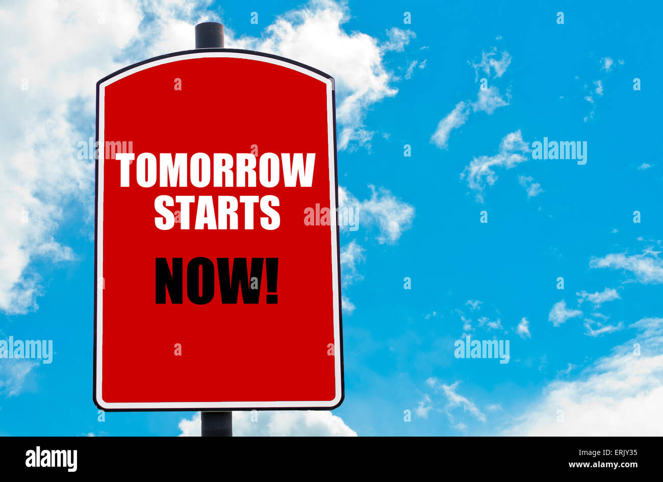 Tomorrow Starts Now motivational quote written on red road sign ...