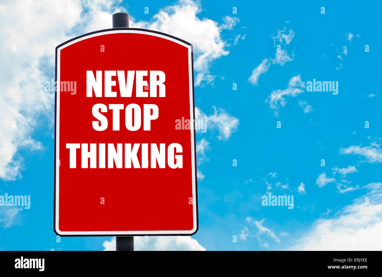 Never Stop Thinking motivational quote written on red road sign ...