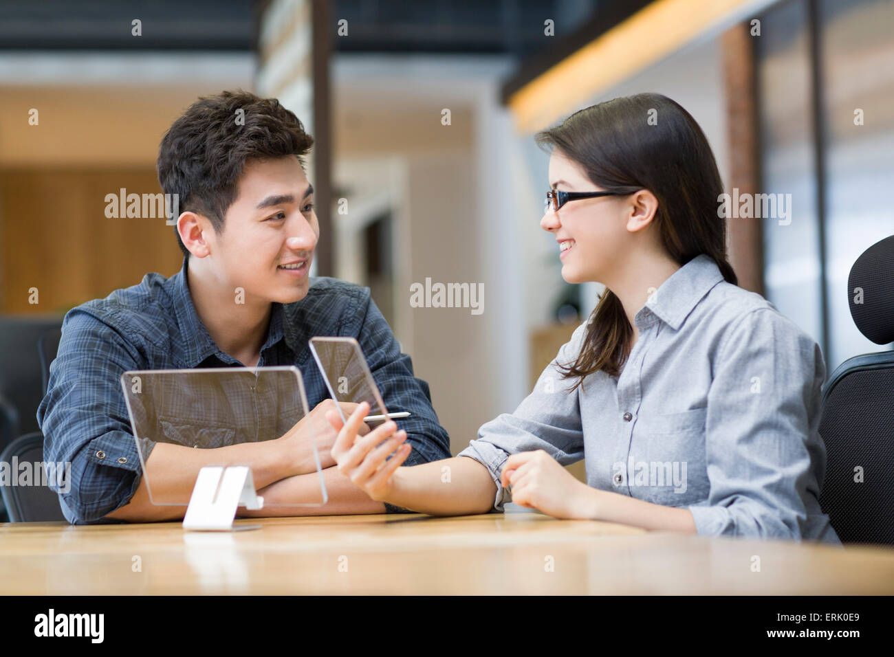 IT workers working in office Stock Photo - Alamy