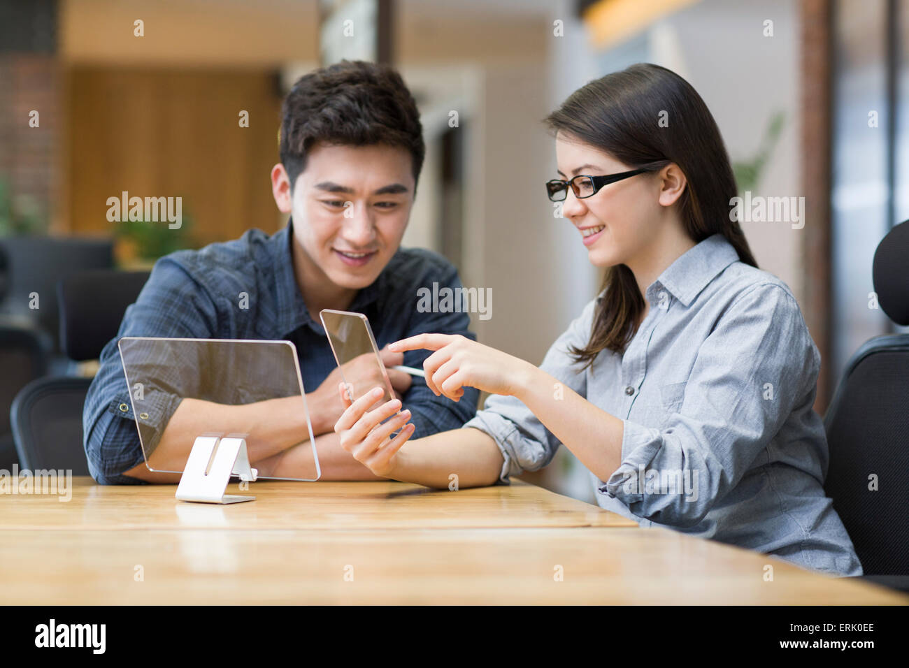 IT workers working in office Stock Photo - Alamy