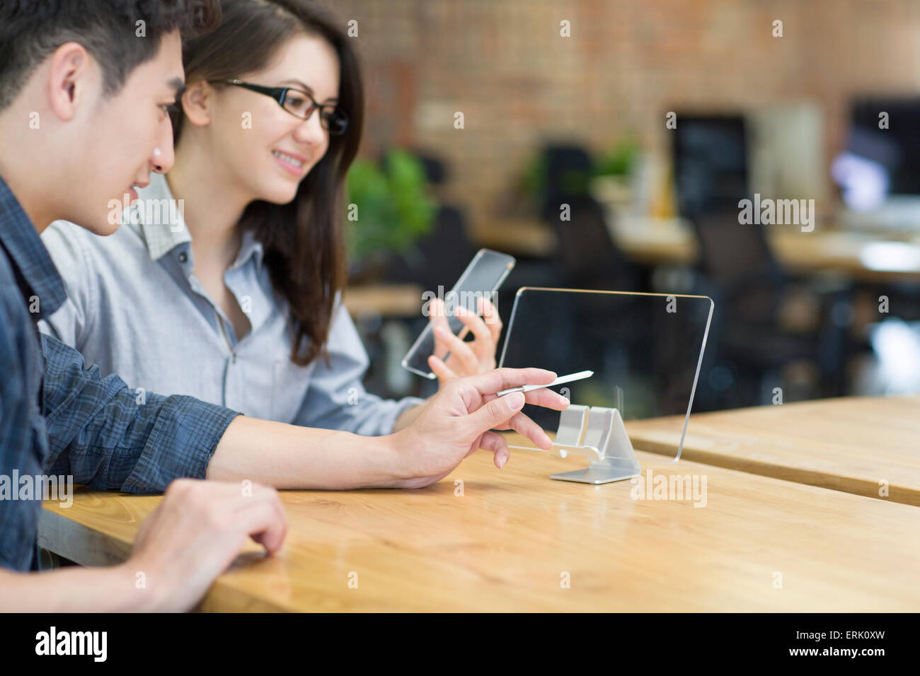 IT workers working in office Stock Photo - Alamy