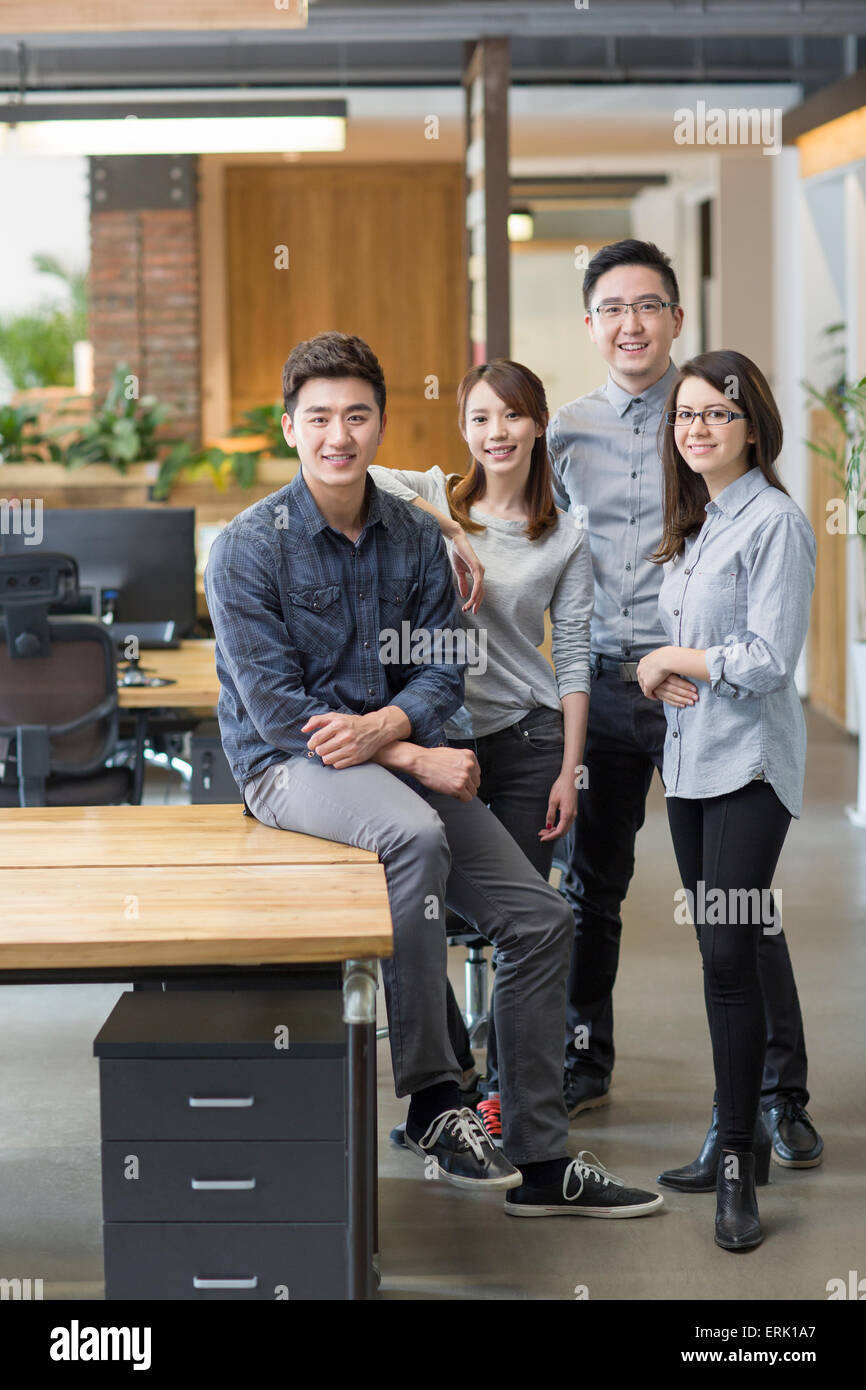 IT workers standing in office Stock Photo - Alamy
