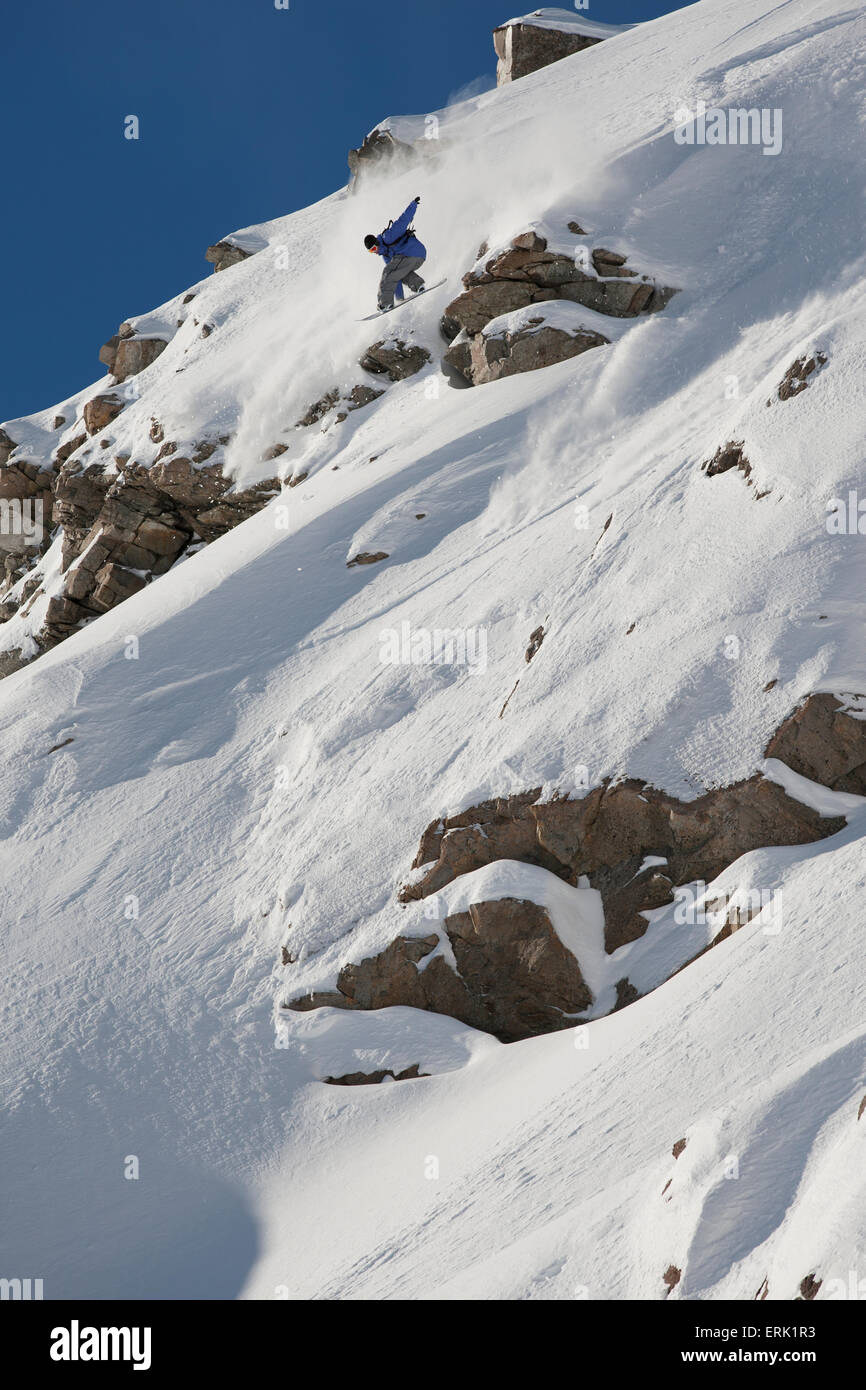 Snowboarding down steep slope; Methven, New Zealand Stock Photo - Alamy