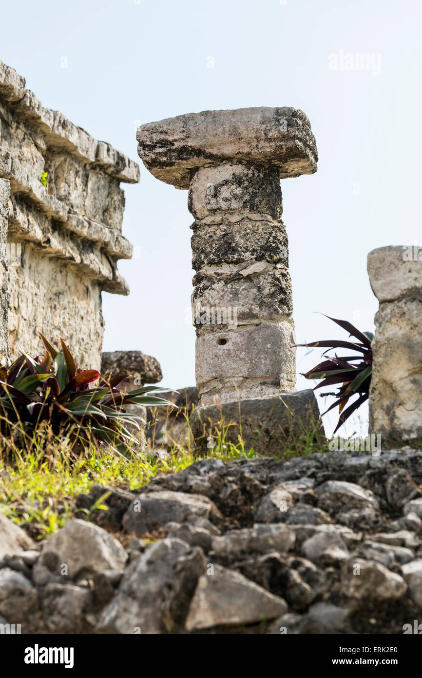 Ancient Mayan round column with flat stone on top; Tulum, Quintana Roo ...