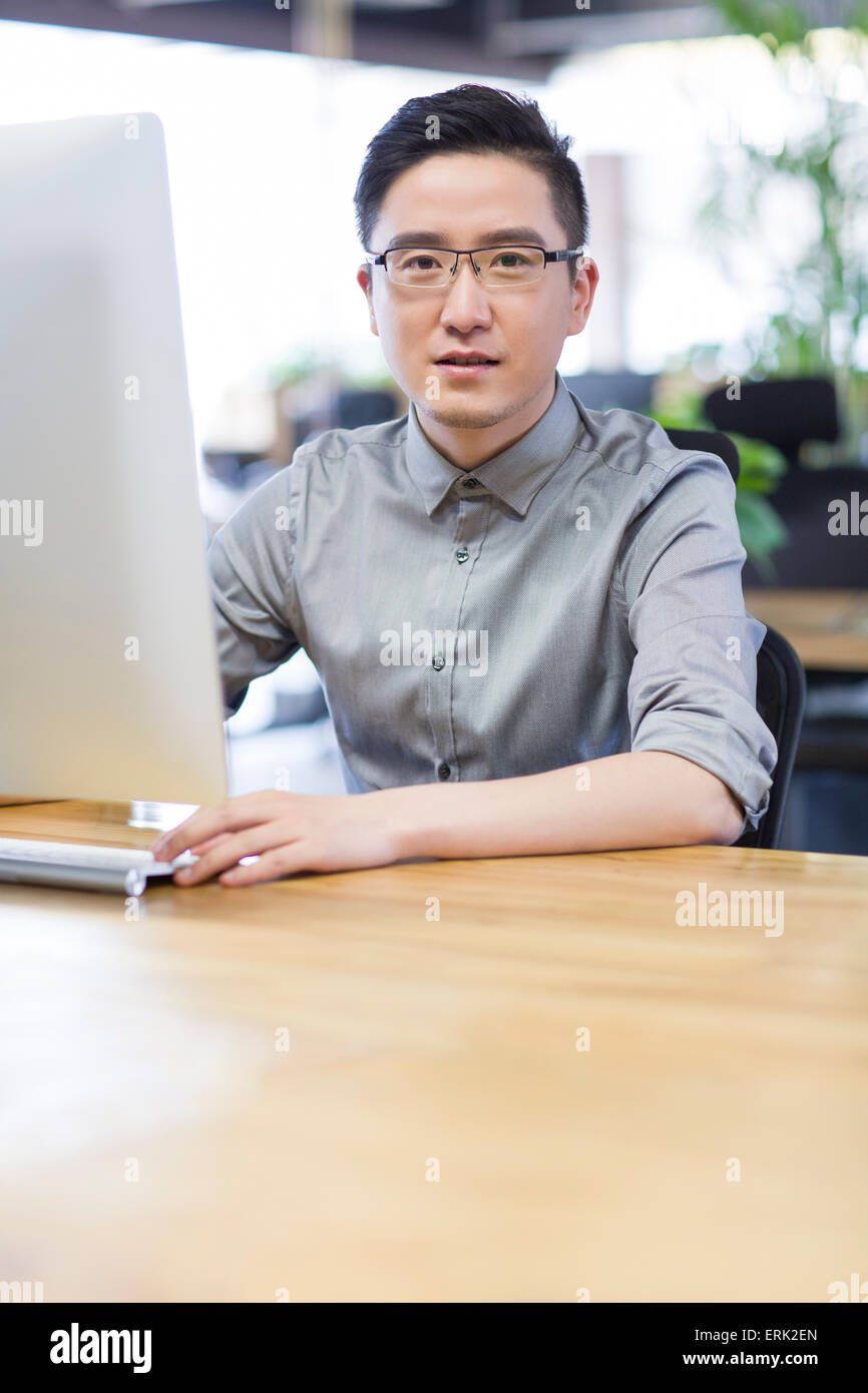 Indian man sitting in front of computer hi-res stock photography and ...