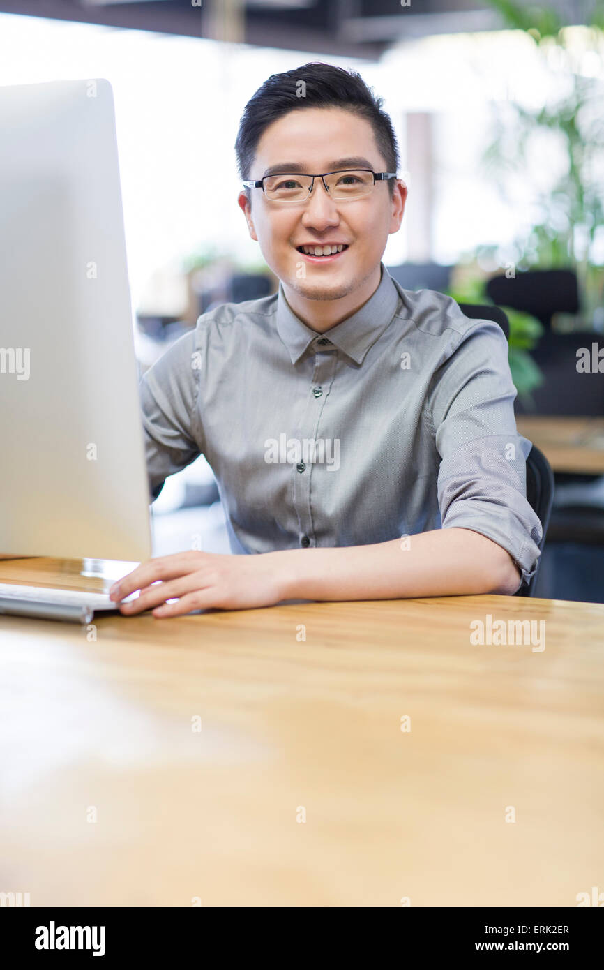 Indian man sitting in front of computer hi-res stock photography and ...
