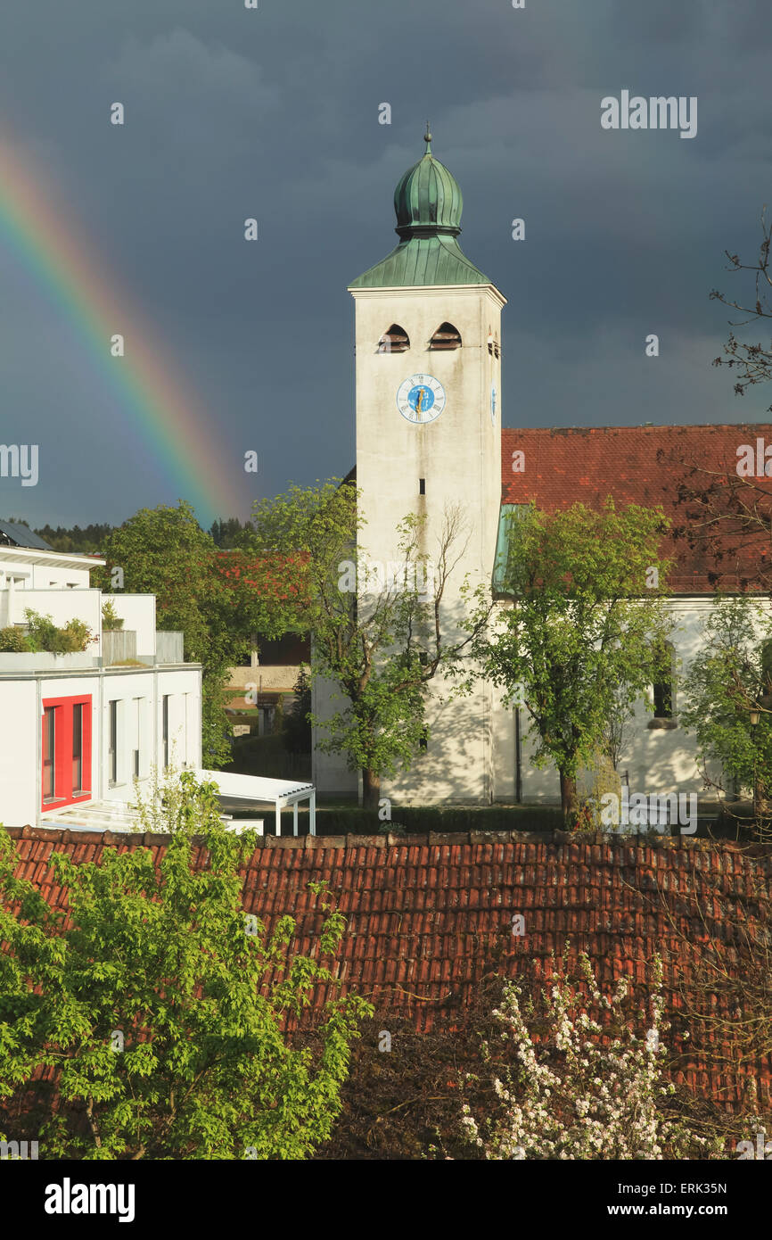 A rainbow beside a clock tower; Gilching, Bayern, Germany Stock Photo ...