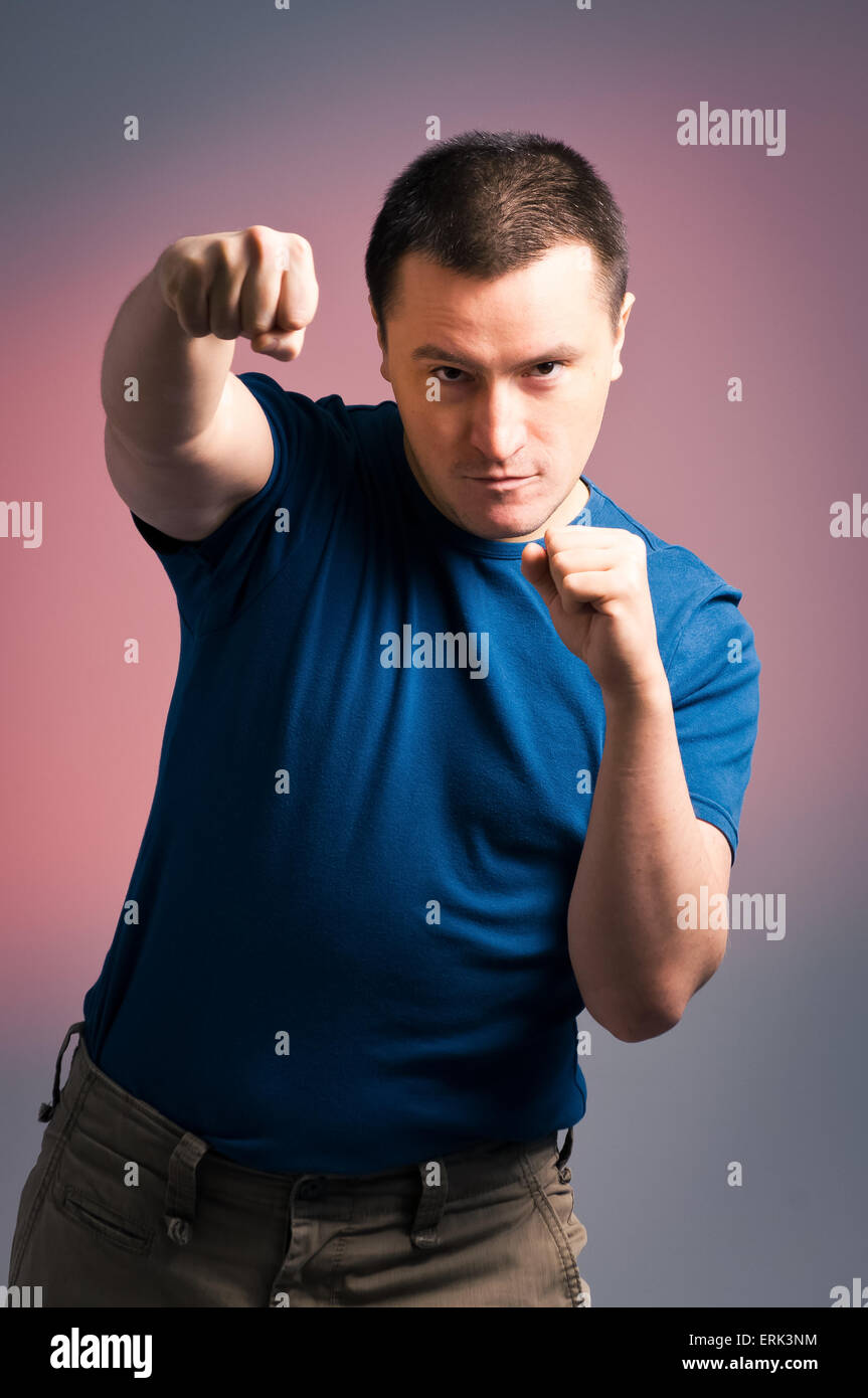 This is a photograph of a young man standing in a boxing position Stock ...