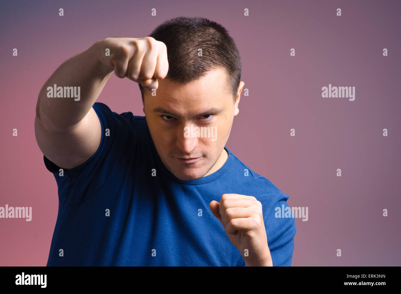 This is a photograph of a young man standing in a boxing position Stock ...