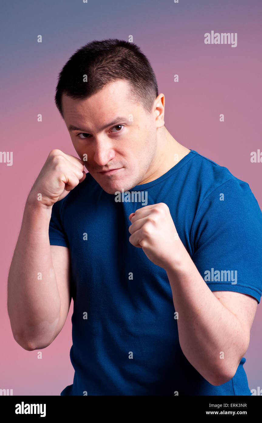 This is a photograph of a young man standing in a boxing position Stock ...