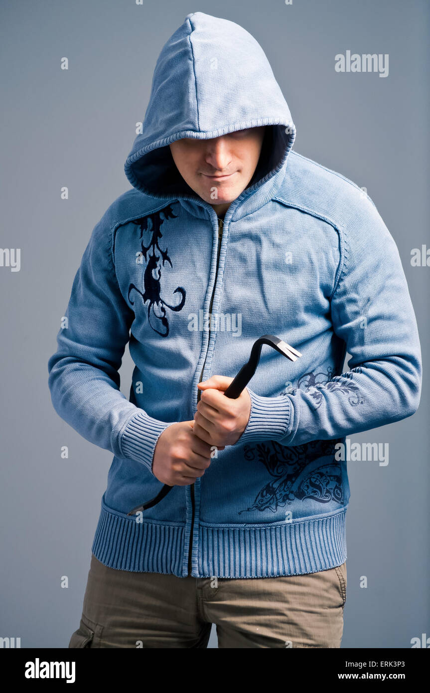 The aggressive bandit with a crowbar Stock Photo - Alamy
