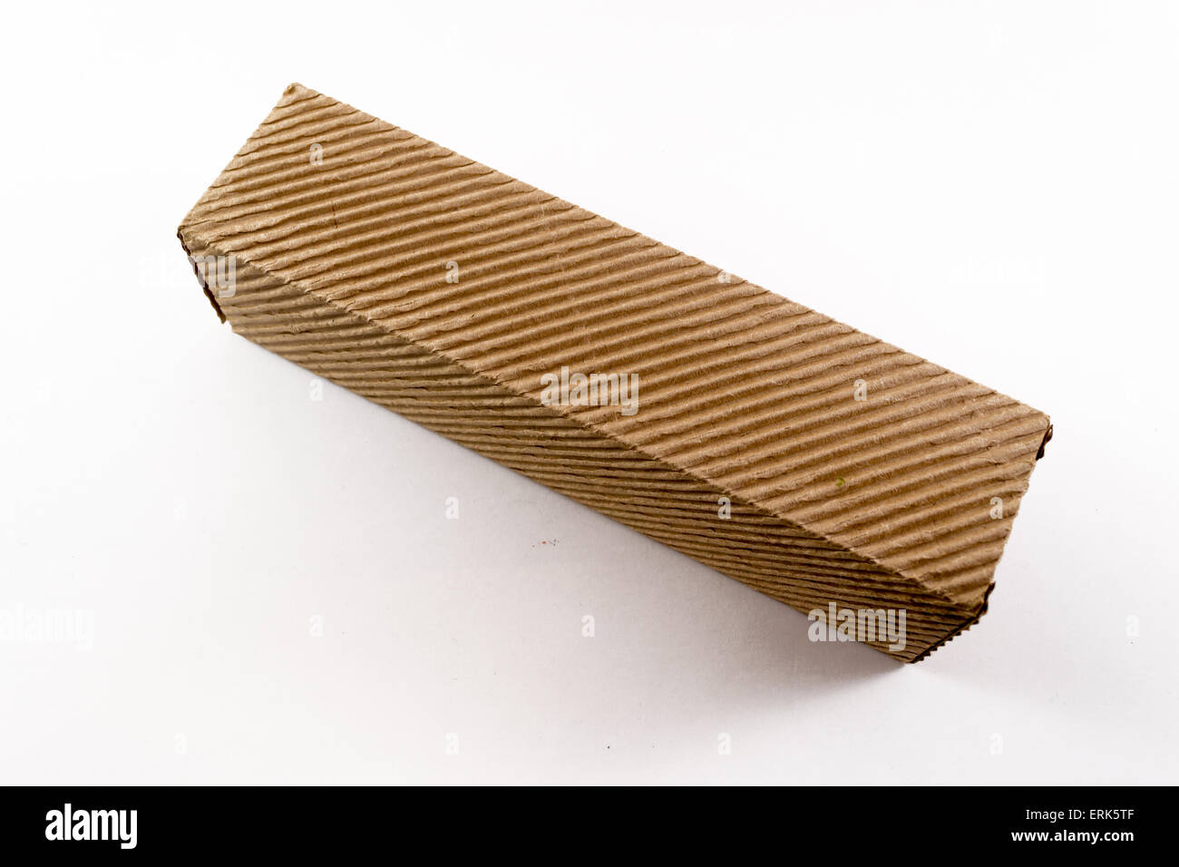 Single elongated corrugated style cardboard packaging texture in close ...