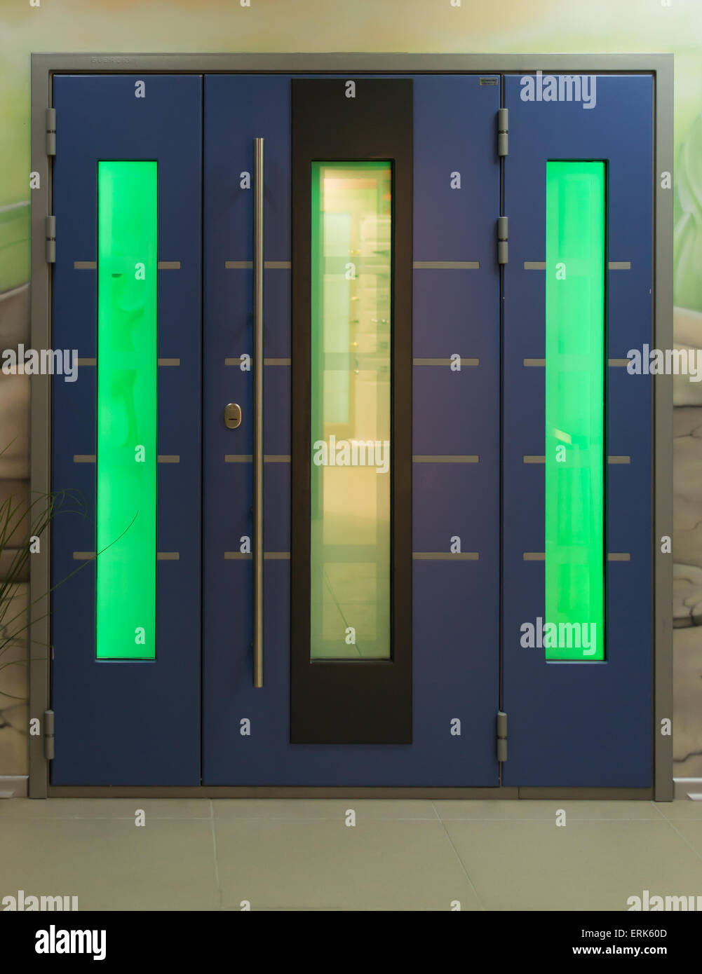 Bright neon gas door and frame in dark blue Stock Photo - Alamy