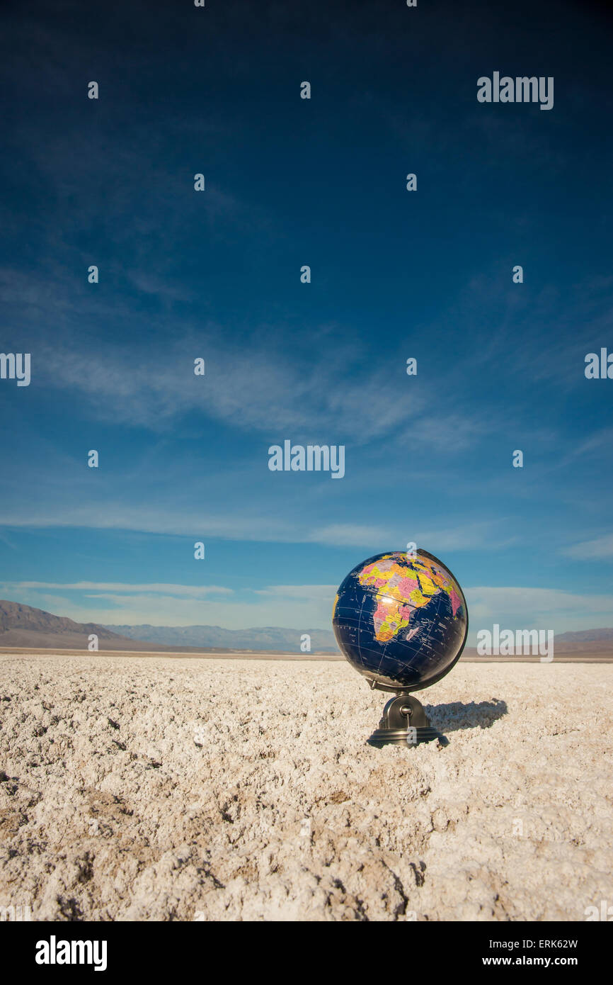 Vertical aspect of earth globe standing in desert wasteland Stock Photo ...