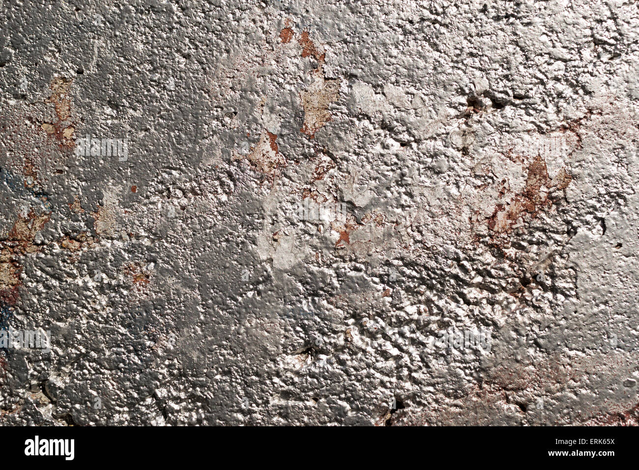 Silver painted brick wall with dirt stains Stock Photo - Alamy