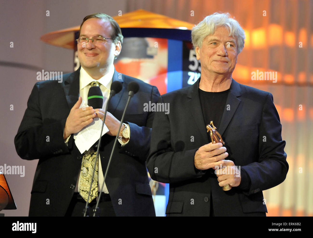 German actor Jurgen Prochnow, right, receives award for his life ...