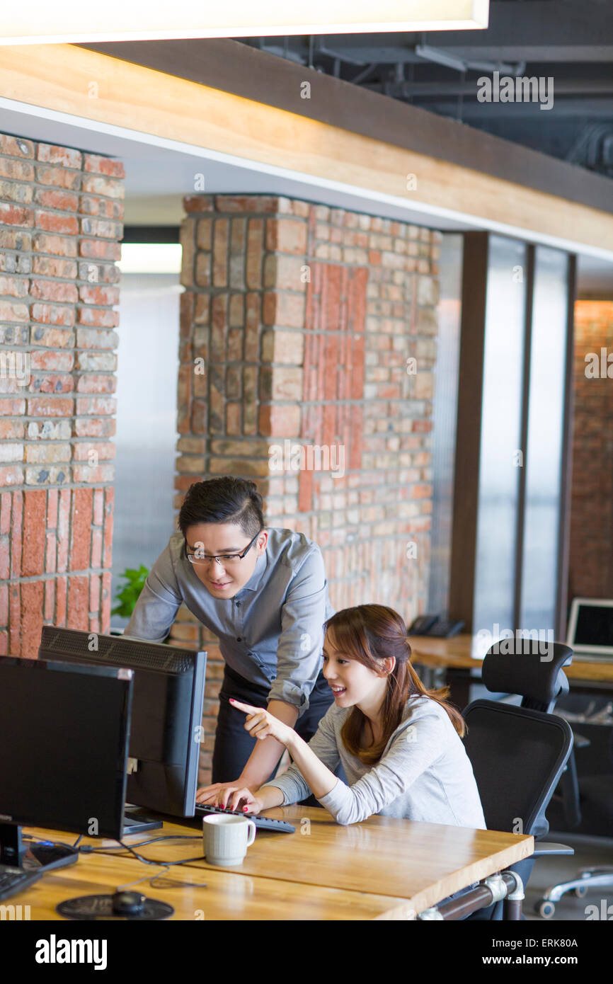 IT workers working in office Stock Photo - Alamy