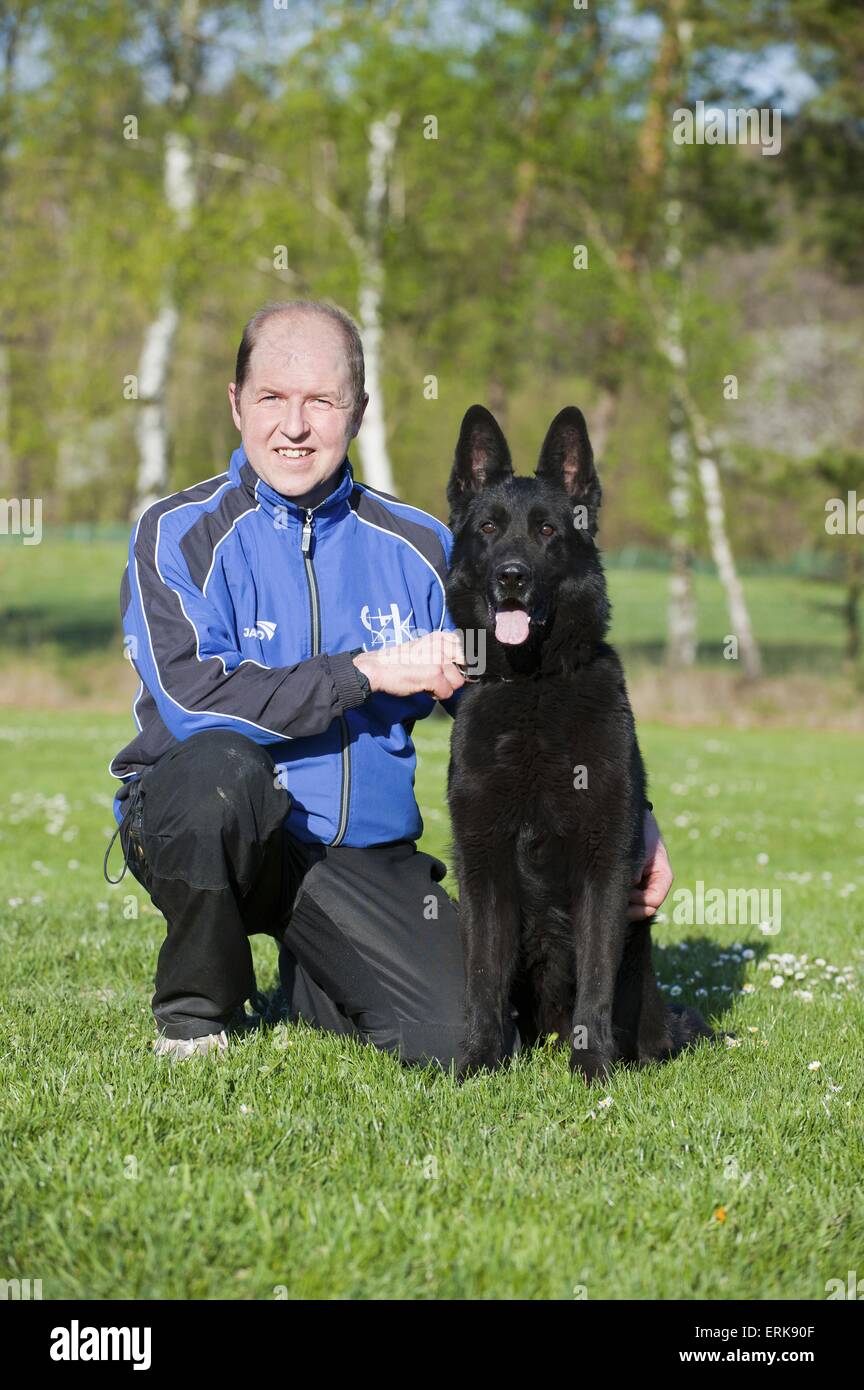 Man german shepherd hi-res stock photography and images - Alamy