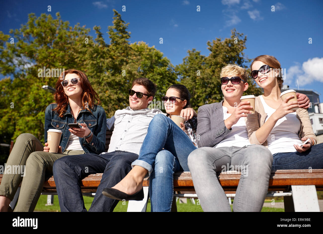 group of students or teenagers drinking coffee Stock Photo - Alamy
