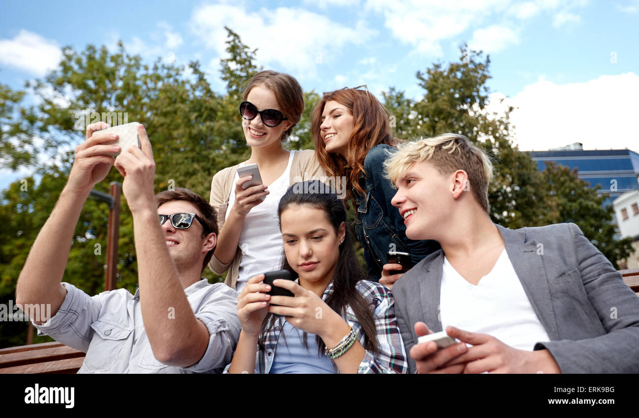 students or teenagers with smartphones at campus Stock Photo - Alamy