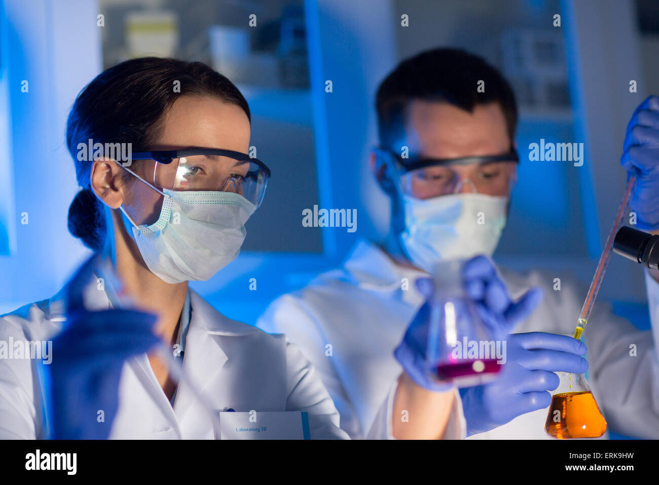 close up of scientists making test in lab Stock Photo - Alamy