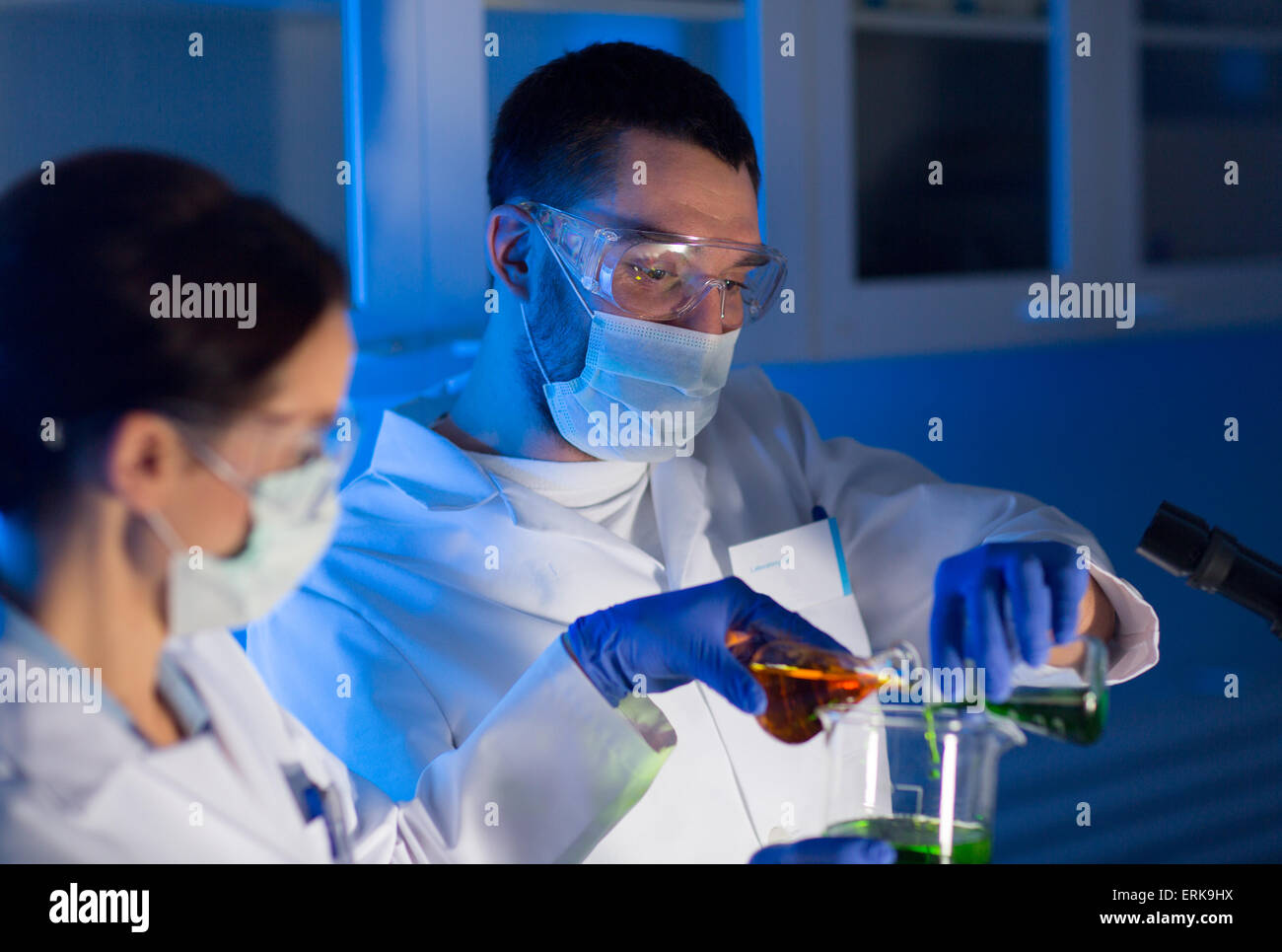 close up of scientists making test in lab Stock Photo - Alamy