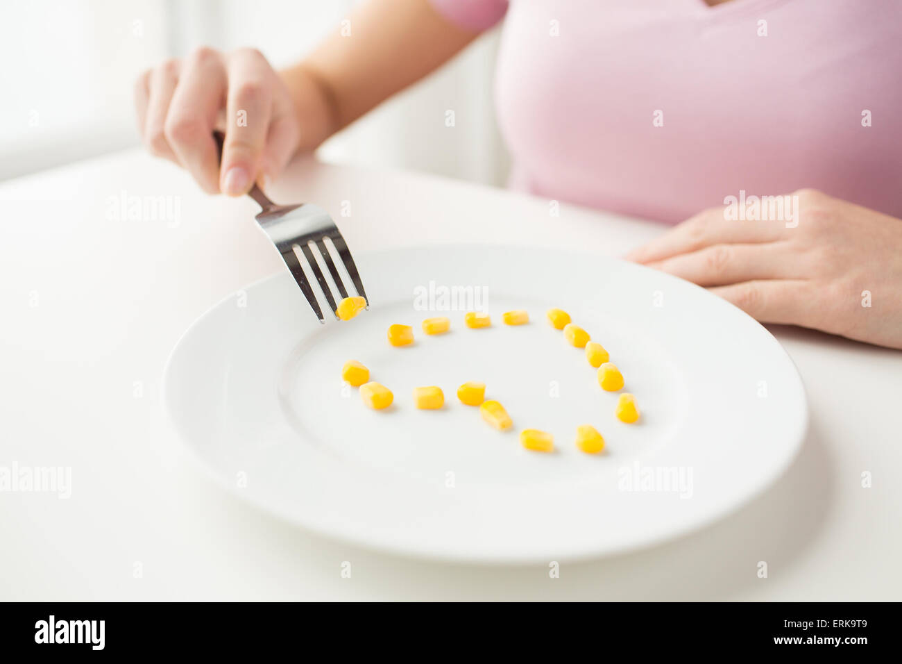 Woman fork eat hi-res stock photography and images - Alamy