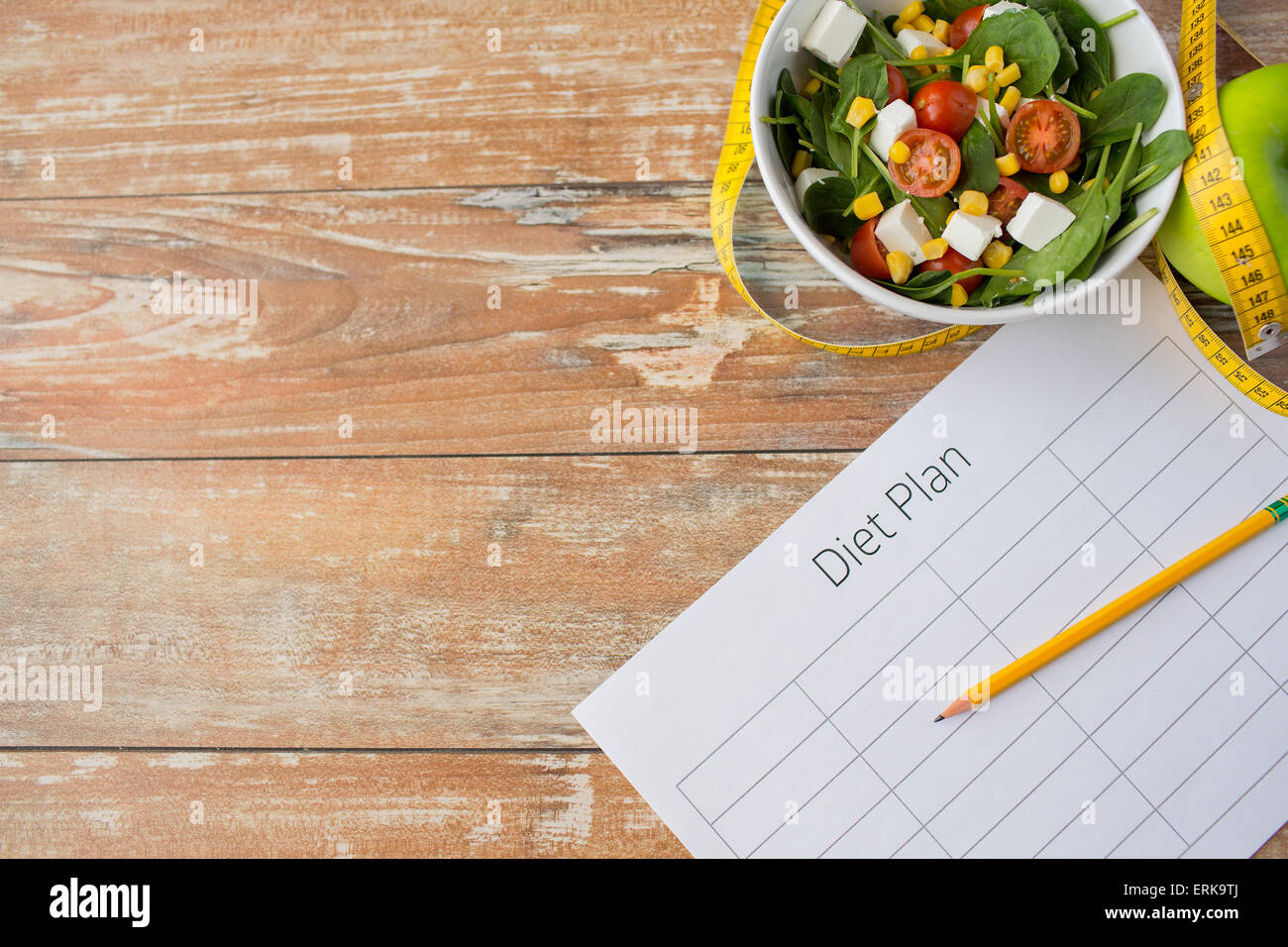 close up of diet plan and food on table Stock Photo - Alamy