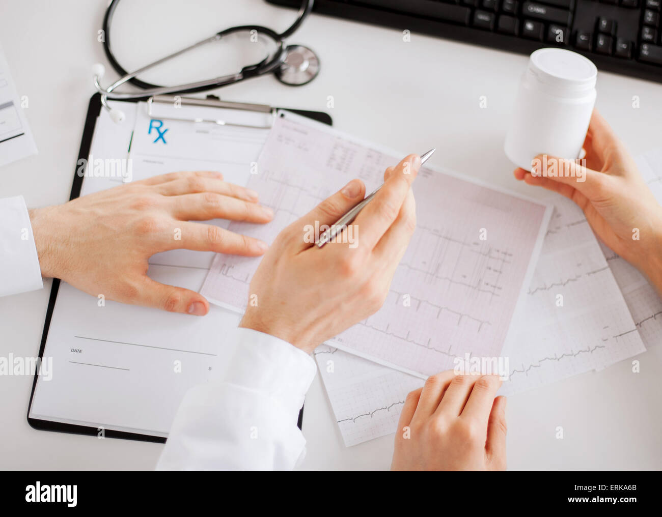 two doctors prescribing medication Stock Photo - Alamy