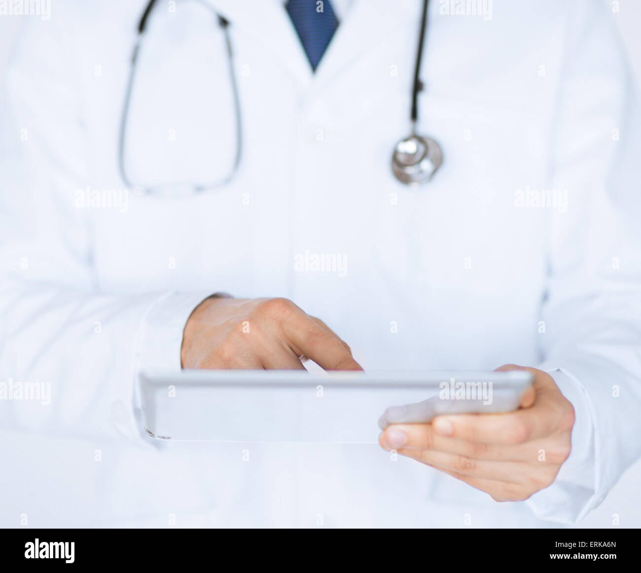 male doctor holding tablet pc Stock Photo - Alamy