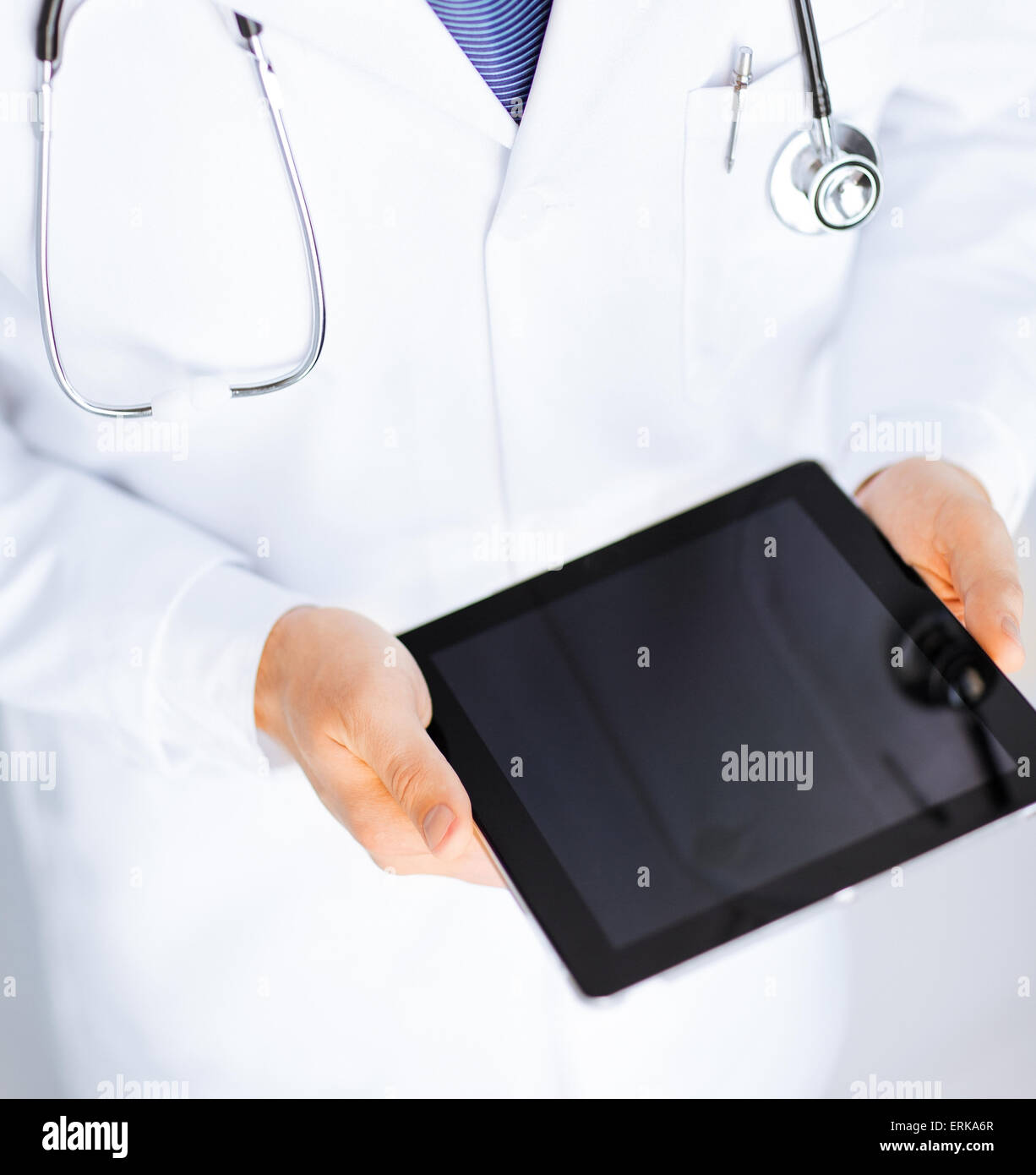 male doctor holding tablet pc Stock Photo - Alamy