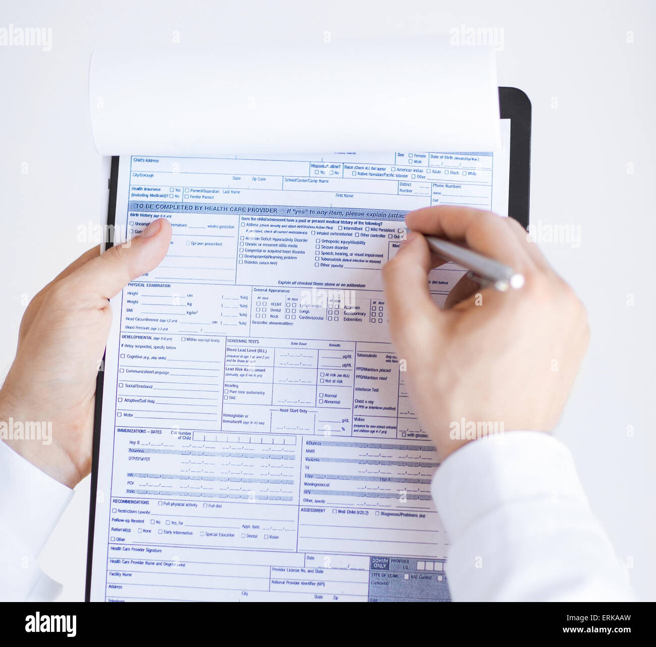 male doctor holding prescription paper in hand Stock Photo - Alamy