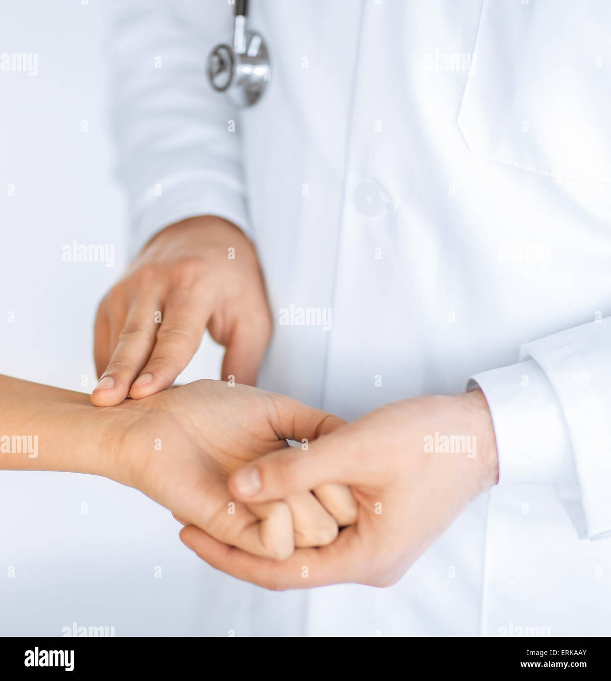 doctor measuring patient heart beat Stock Photo - Alamy