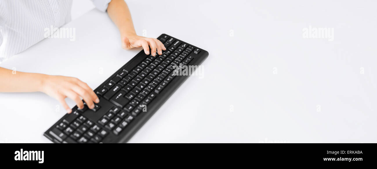 student girls hands typing on keyboard Stock Photo - Alamy